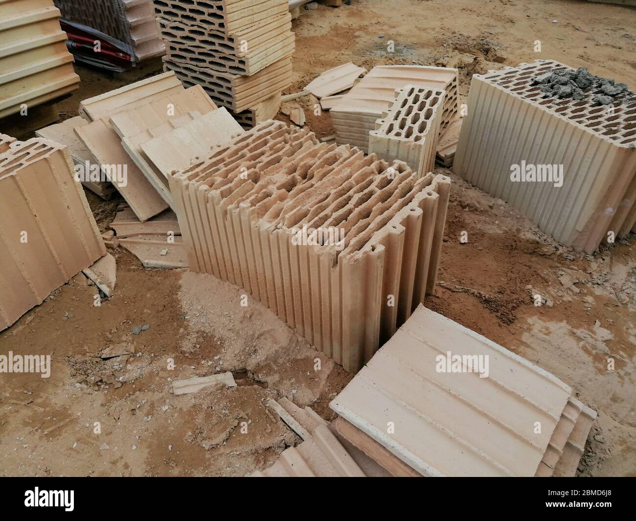Damaged ceramic construction block in the construction site. Wastage ...
