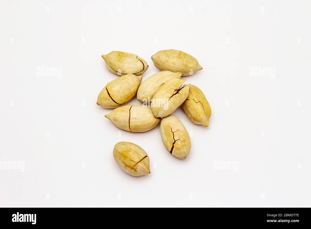 Ripe pecan isolated on white background. Traditional ingredient for ...