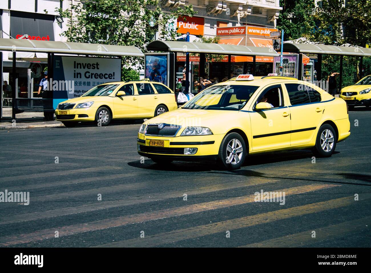 Athens Greece August 30, 2019 View of Greek yellow taxi rolling through ...