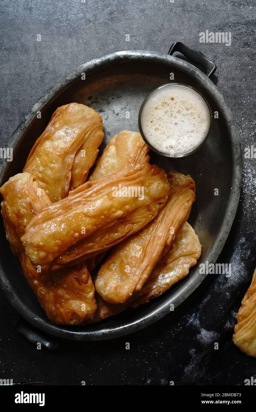 Homemade Indian sweet khaja /chirote or Madakku san, selective focus ...