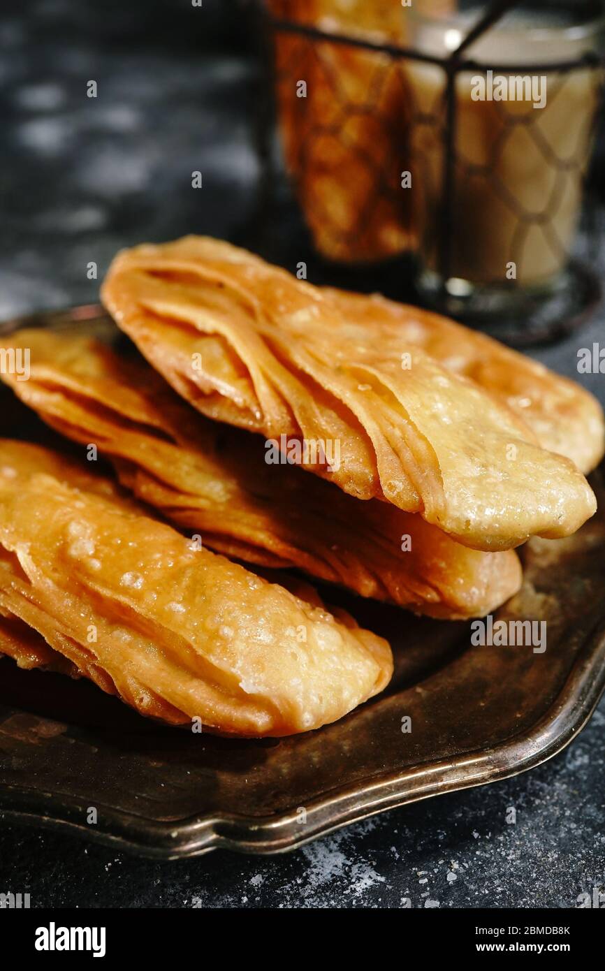 Homemade Indian sweet khaja /chirote or Madakku san, selective focus ...