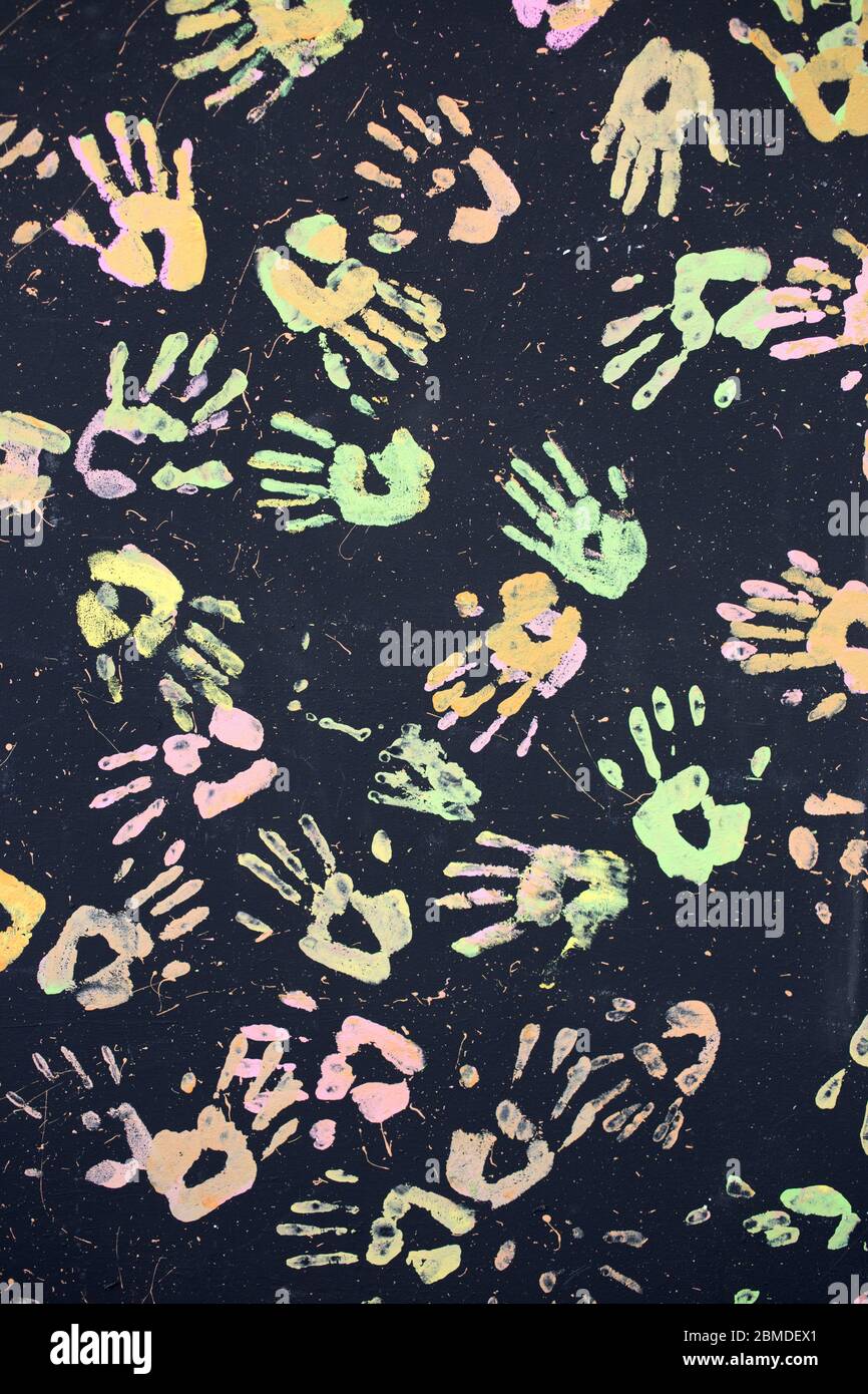 Colorful hand painting on black background Stock Photo - Alamy
