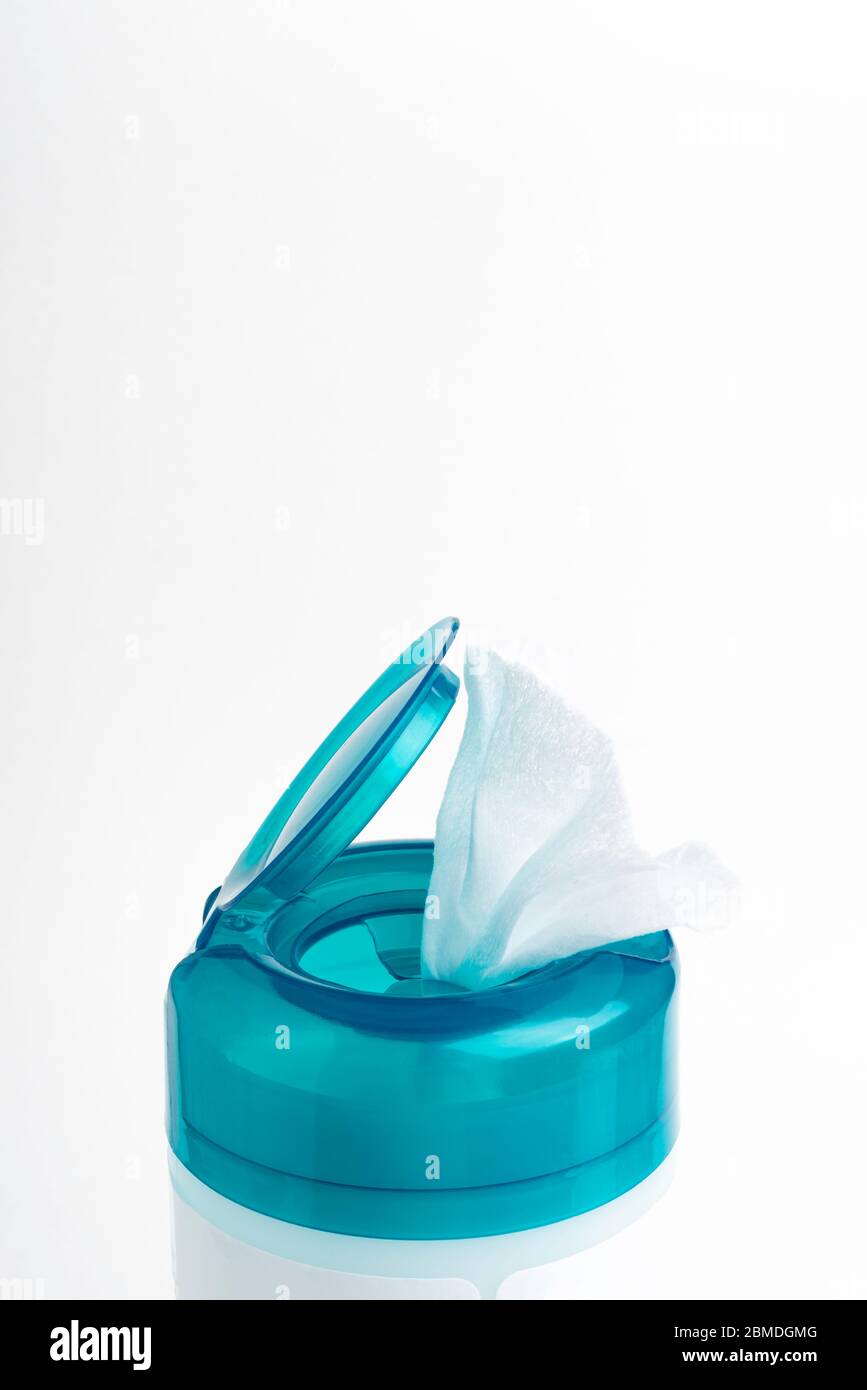 A close-up shot of an open aquamarine push top cap of a disinfectant ...