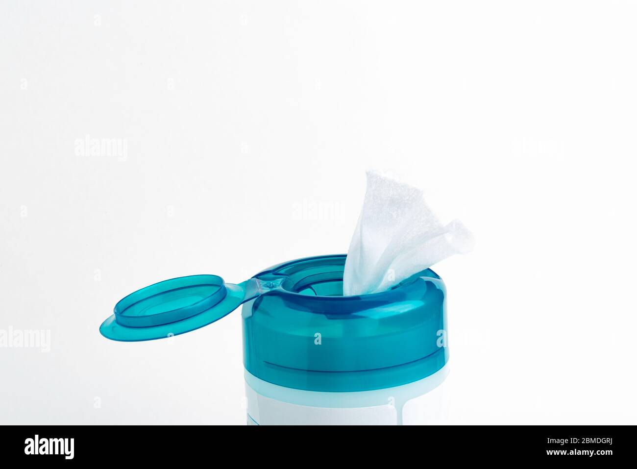 A close-up shot of an open aquamarine push top cap of a disinfectant ...