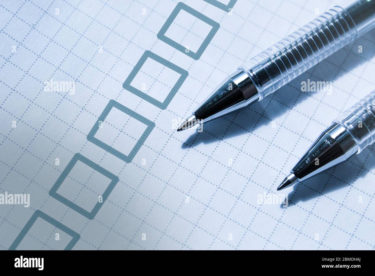 Ballpoint pen and voting form. A sheet of paper with a graph for a ...