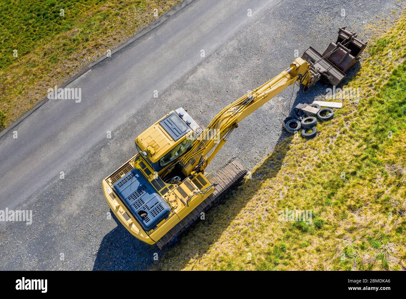 excavator on an construction site from above Stock Photo - Alamy