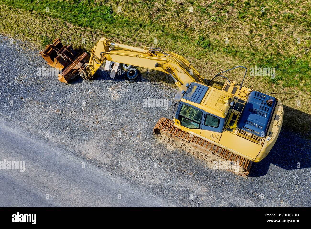 excavator on an construction site from above Stock Photo - Alamy