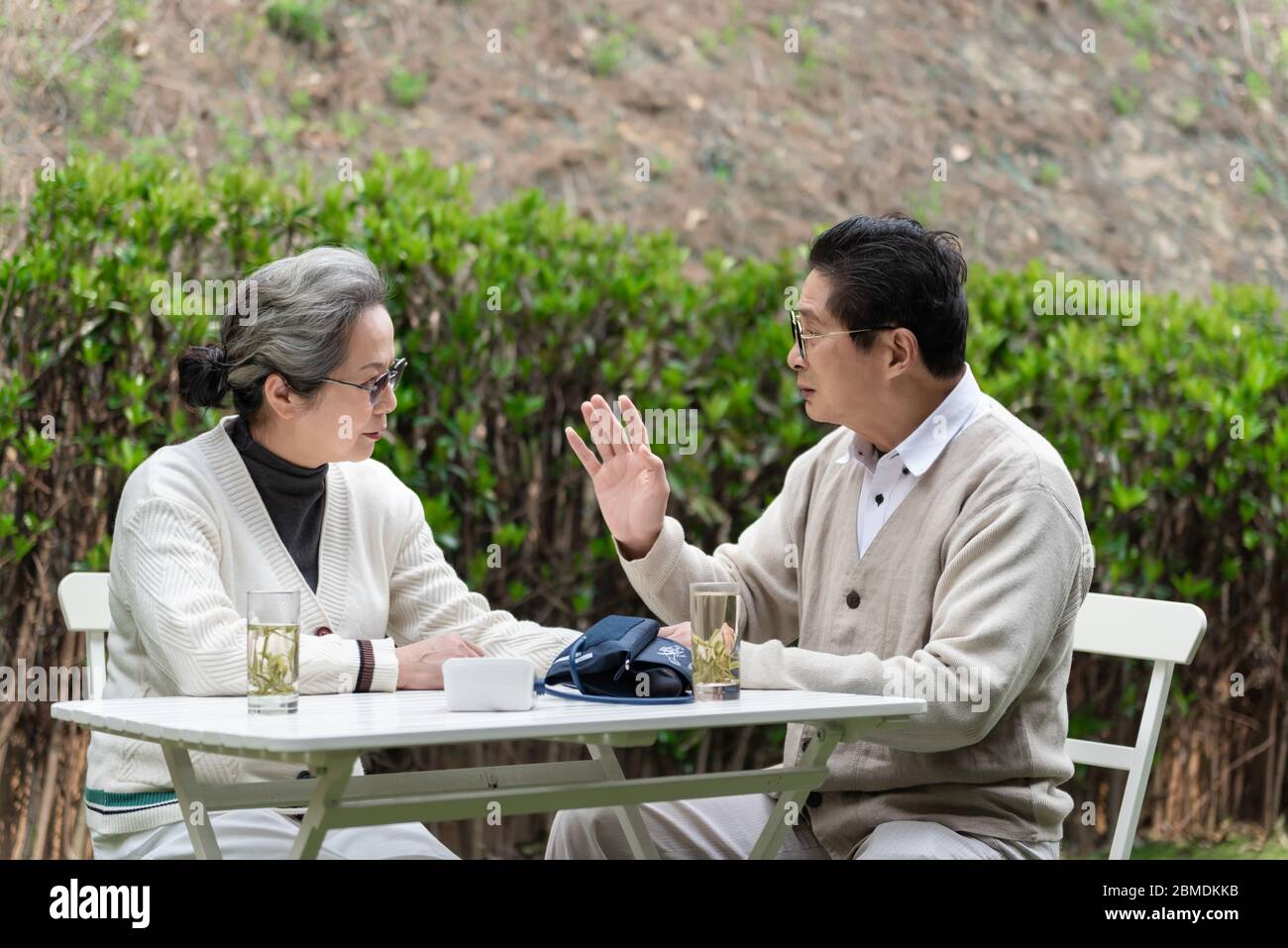 An Asian elderly couple is measuring blood pressure Stock Photo - Alamy