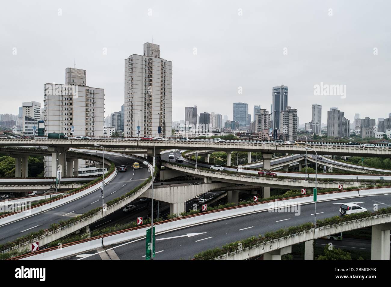 Modern city with highway interchange Stock Photo - Alamy