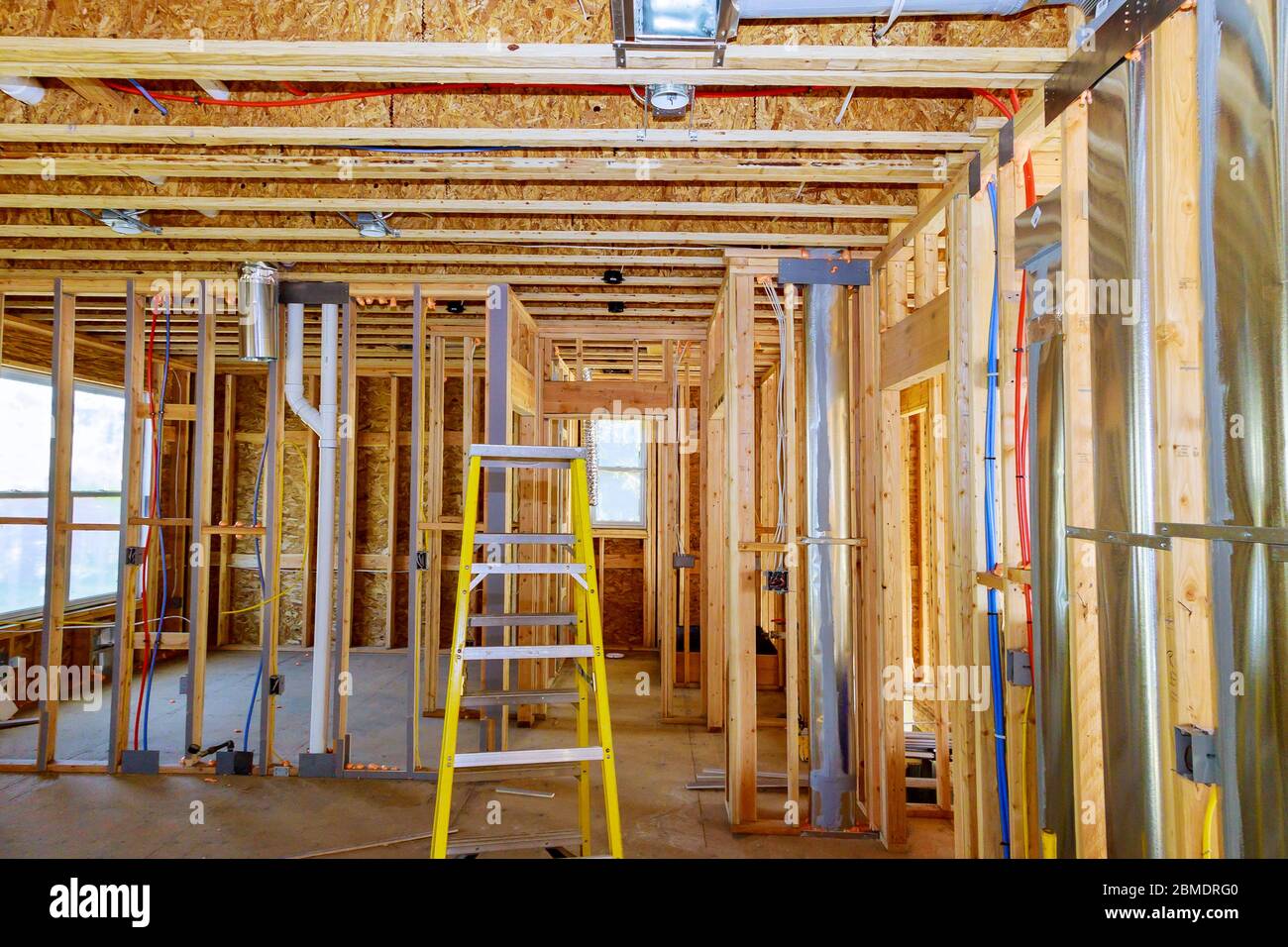 Framed residential home with basic rough plumbing completed in new ...