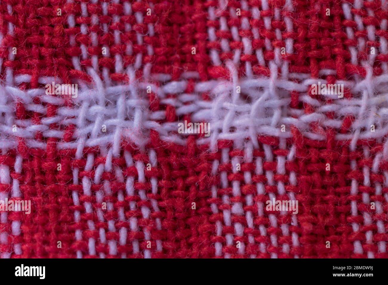 Red and white table napkins texture. Close up. Background of a textile ...