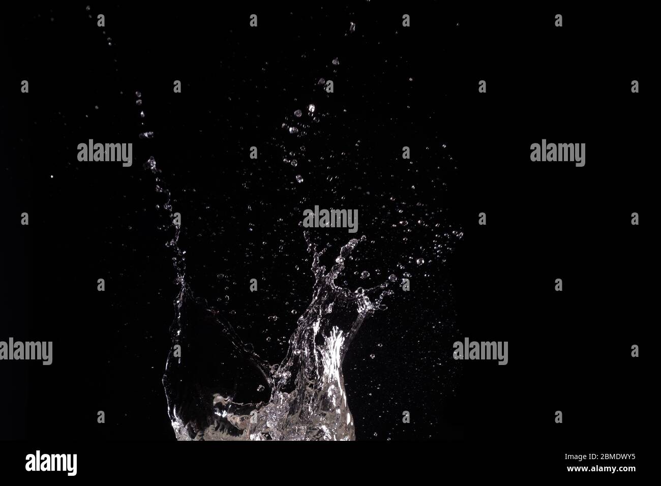 White water splash isolated on black background Stock Photo - Alamy