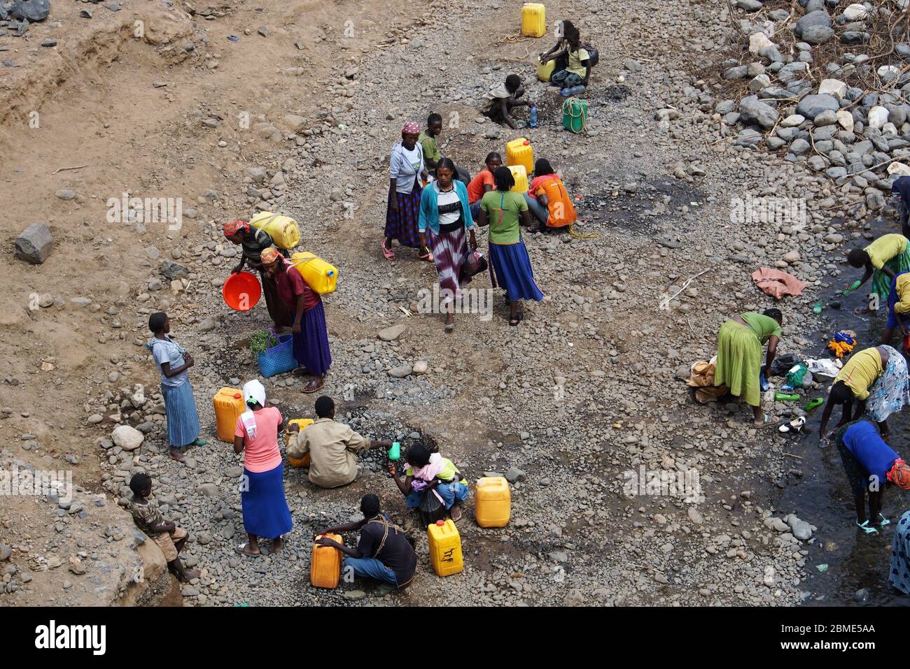 People Fetching Water High Resolution Stock Photography and Images - Alamy