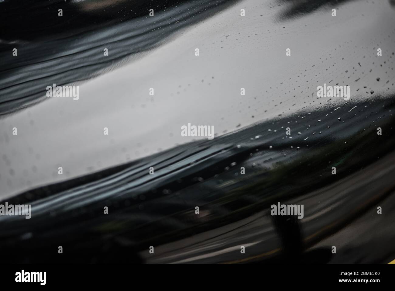 Racing car wet surface detail Stock Photo - Alamy