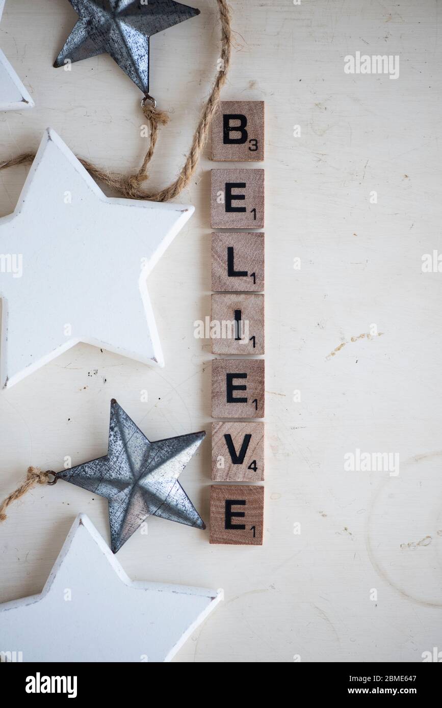 Believe in block letters Stock Photo - Alamy