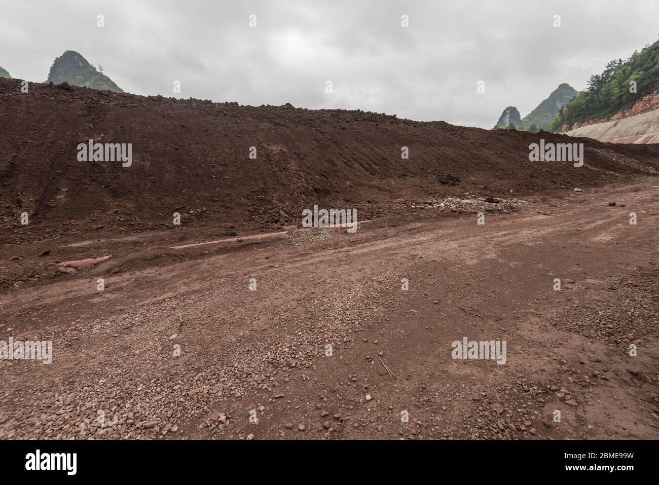 gravel road and mound in mining area Stock Photo - Alamy