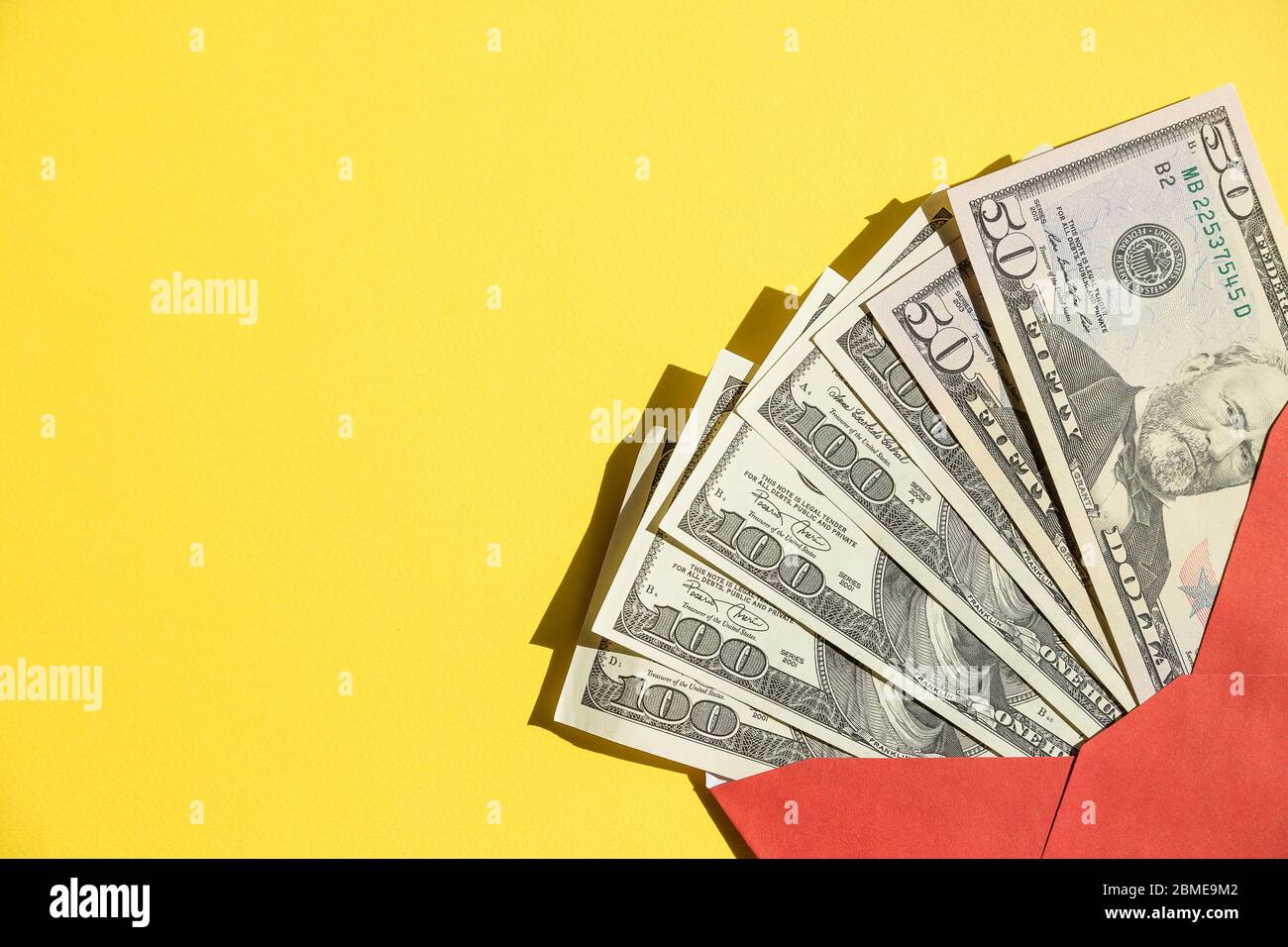 Hundred dollar bills in envelope hi-res stock photography and images ...