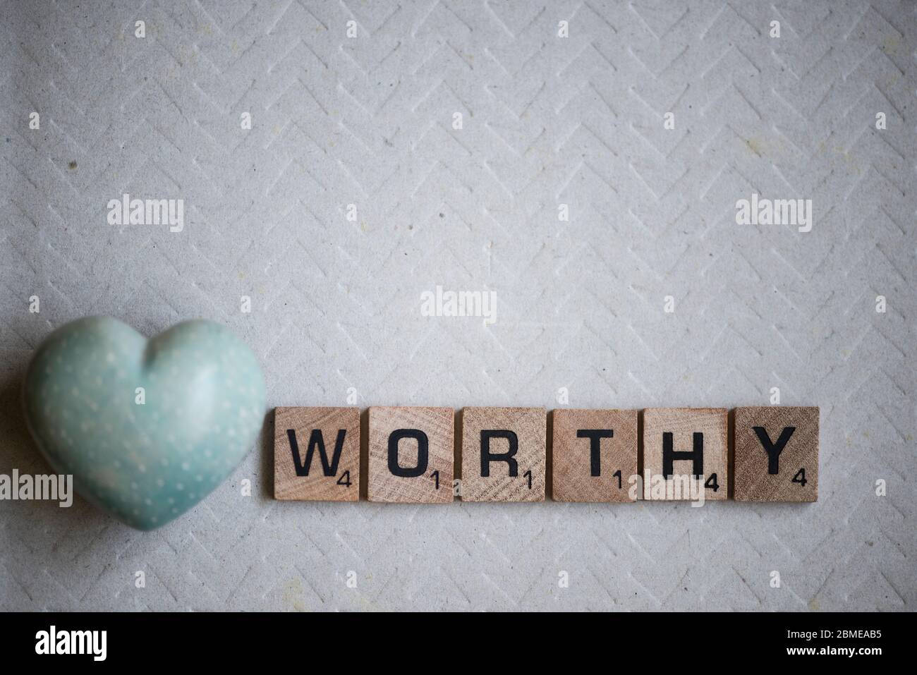 Worthy in wooden letters hi-res stock photography and images - Alamy