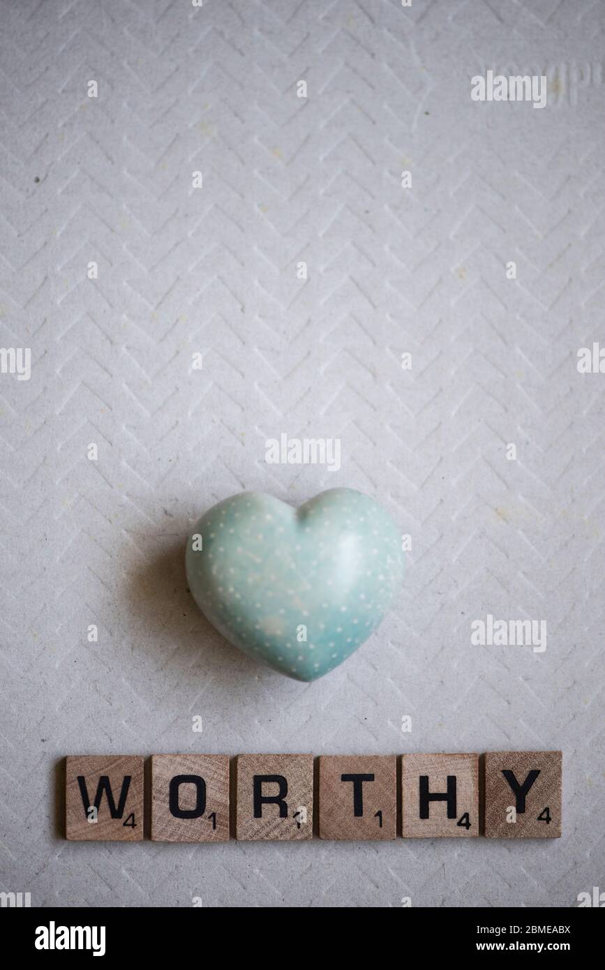 Word worthy in block letters hi-res stock photography and images - Alamy