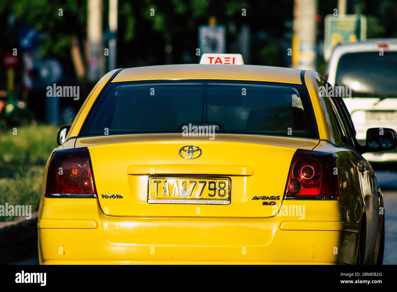 Athens Greece September 7, 2019 View of Greek yellow taxi driving ...