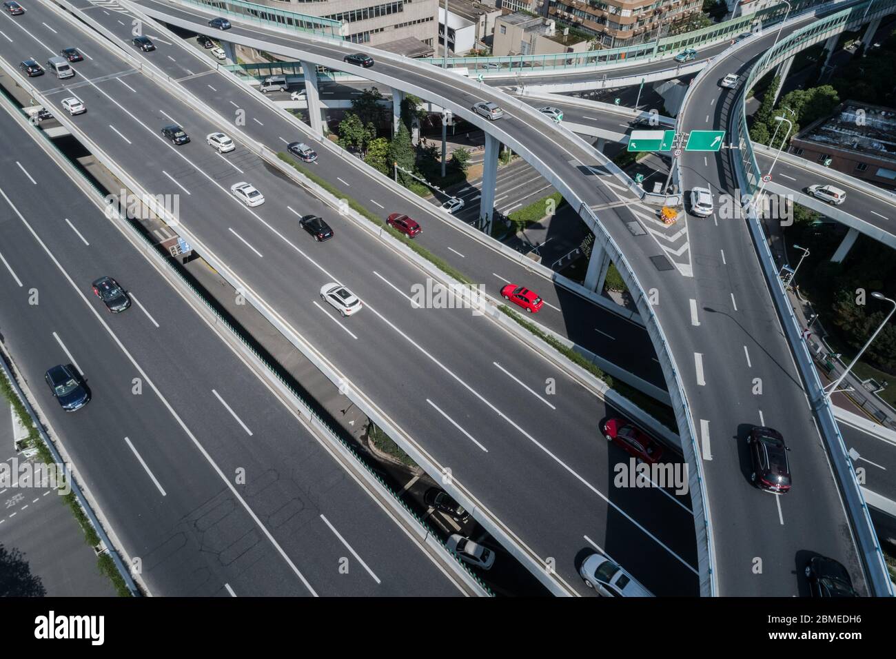 Aerial view of highway and overpass in city on sunny day Stock Photo ...