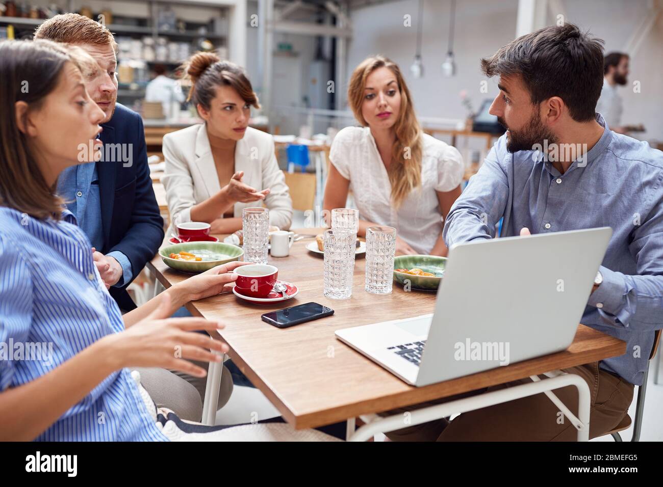 Sitting working group discussion hi-res stock photography and images ...