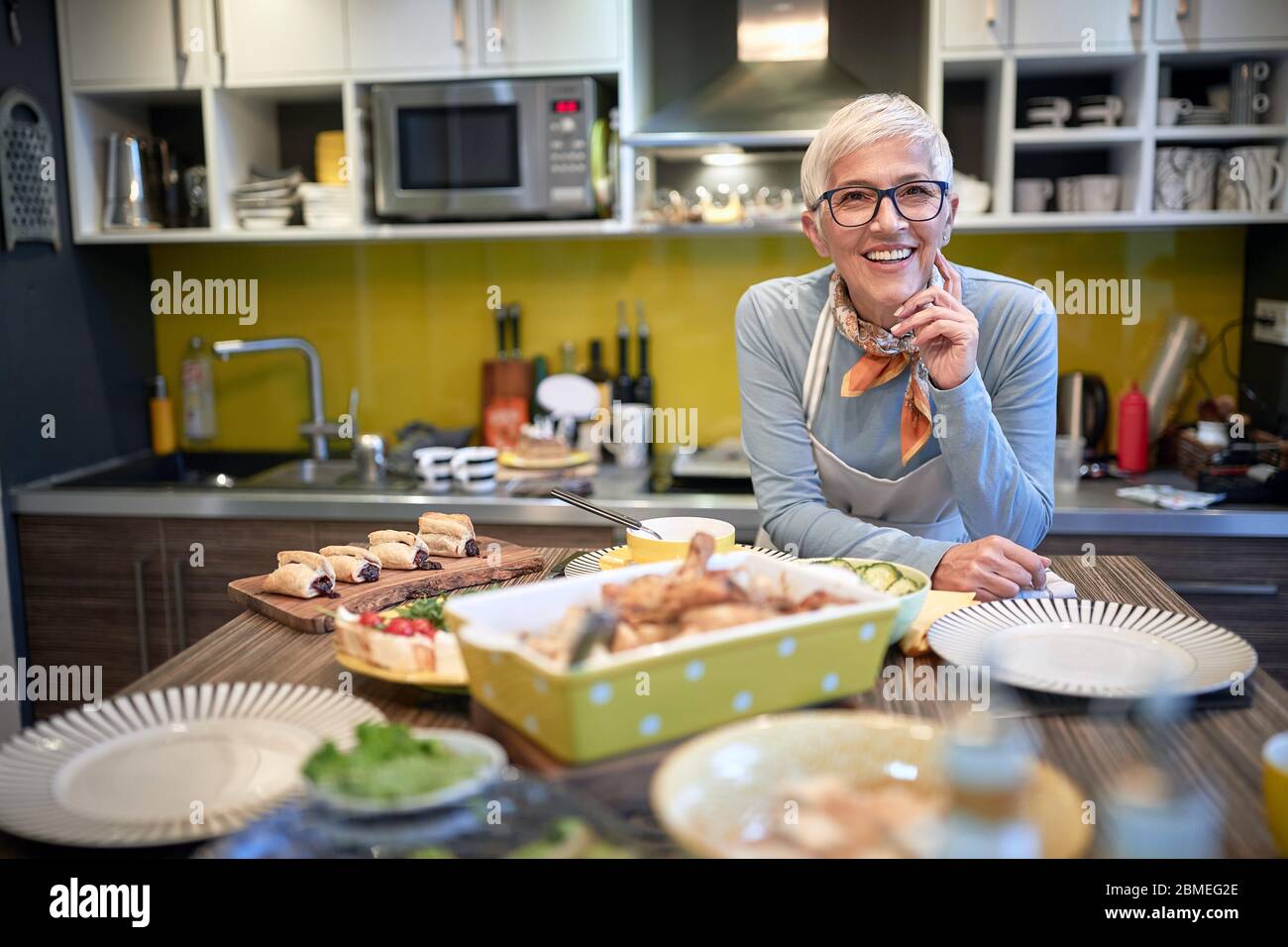 Grandma at the dinner table hi-res stock photography and images - Alamy