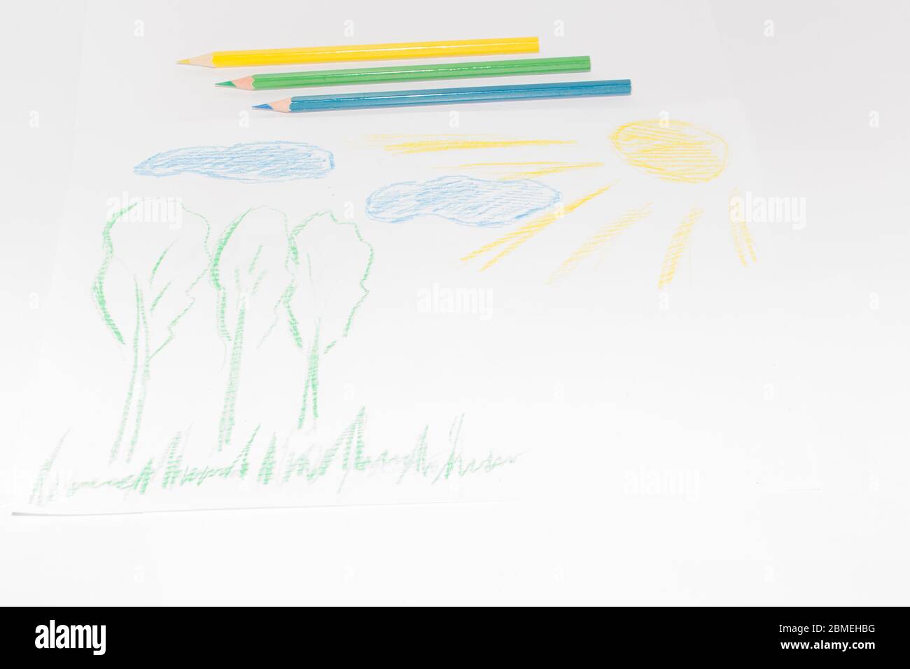 Child's color drawing on a white paper with color pencils Stock Photo ...