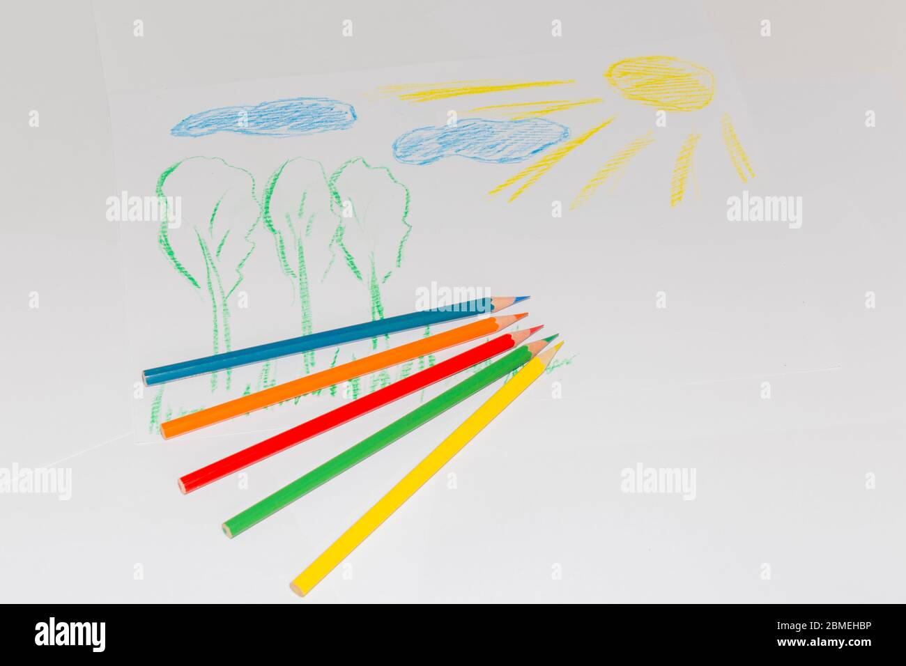 Child's color drawing on a white paper with color pencils Stock Photo ...