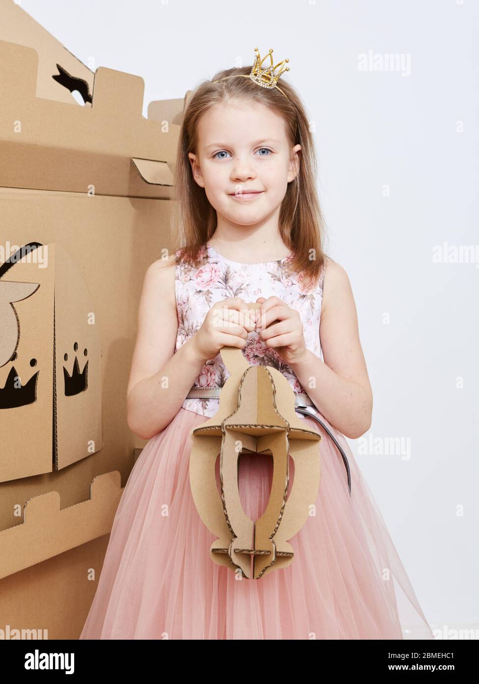 The princess play with cardboard castle tower Stock Photo - Alamy