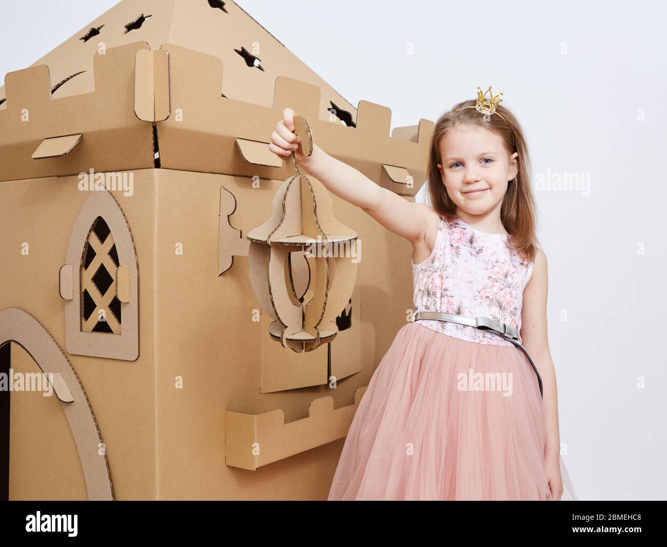 The princess play with cardboard castle tower Stock Photo - Alamy