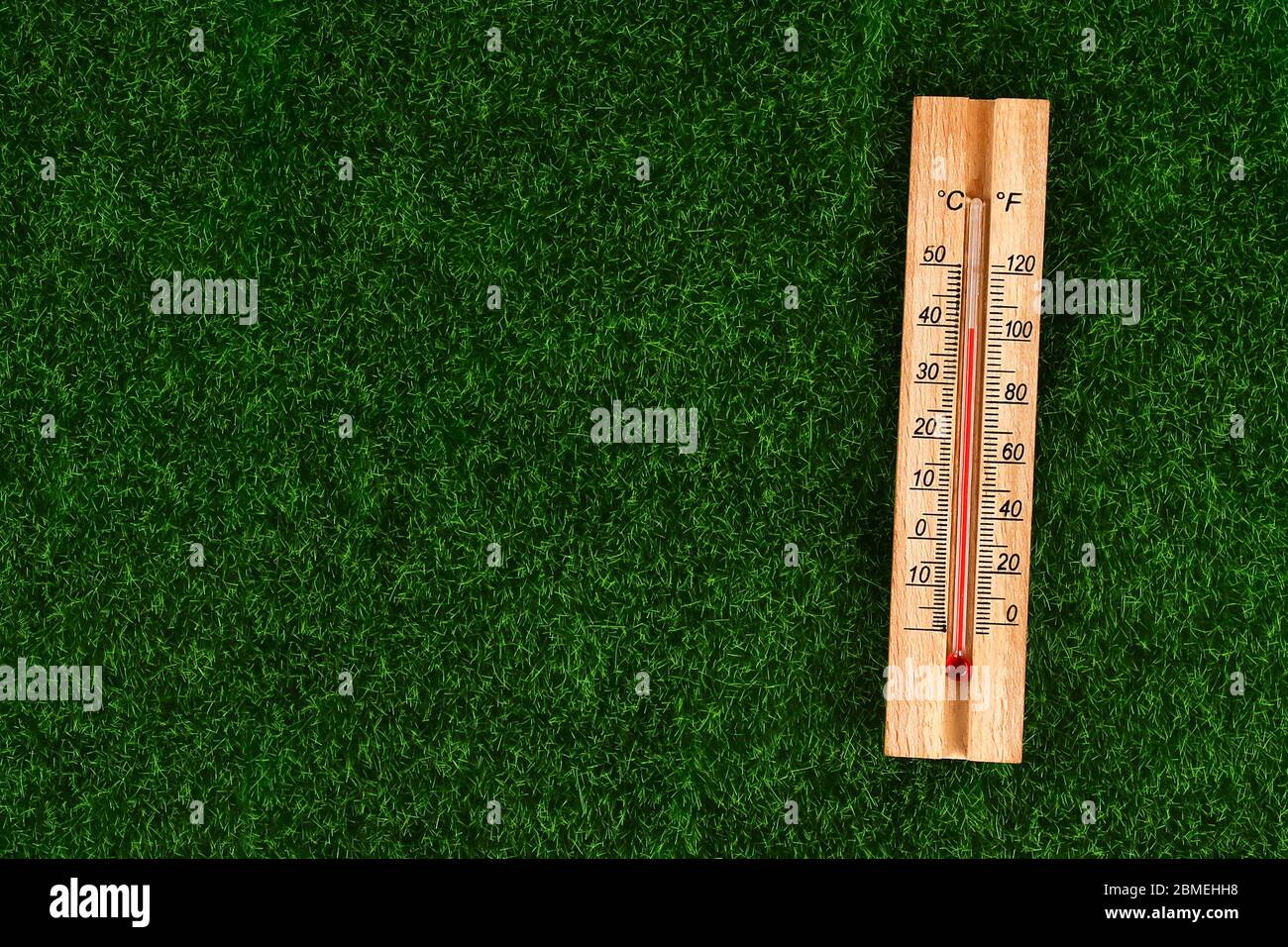 Thermometer displaying high 40 degree hot temperatures in sun summer ...