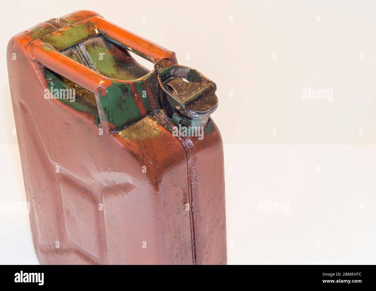 old metal canister with fuel on a light background Stock Photo - Alamy