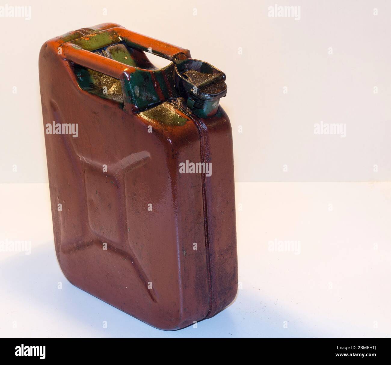 old metal canister with fuel on a light background Stock Photo - Alamy