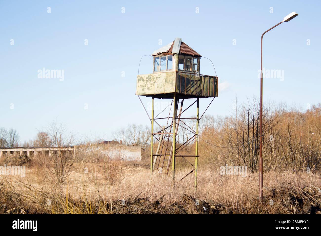 Lookout tower on a background of blue sky with white clouds Stock Photo ...