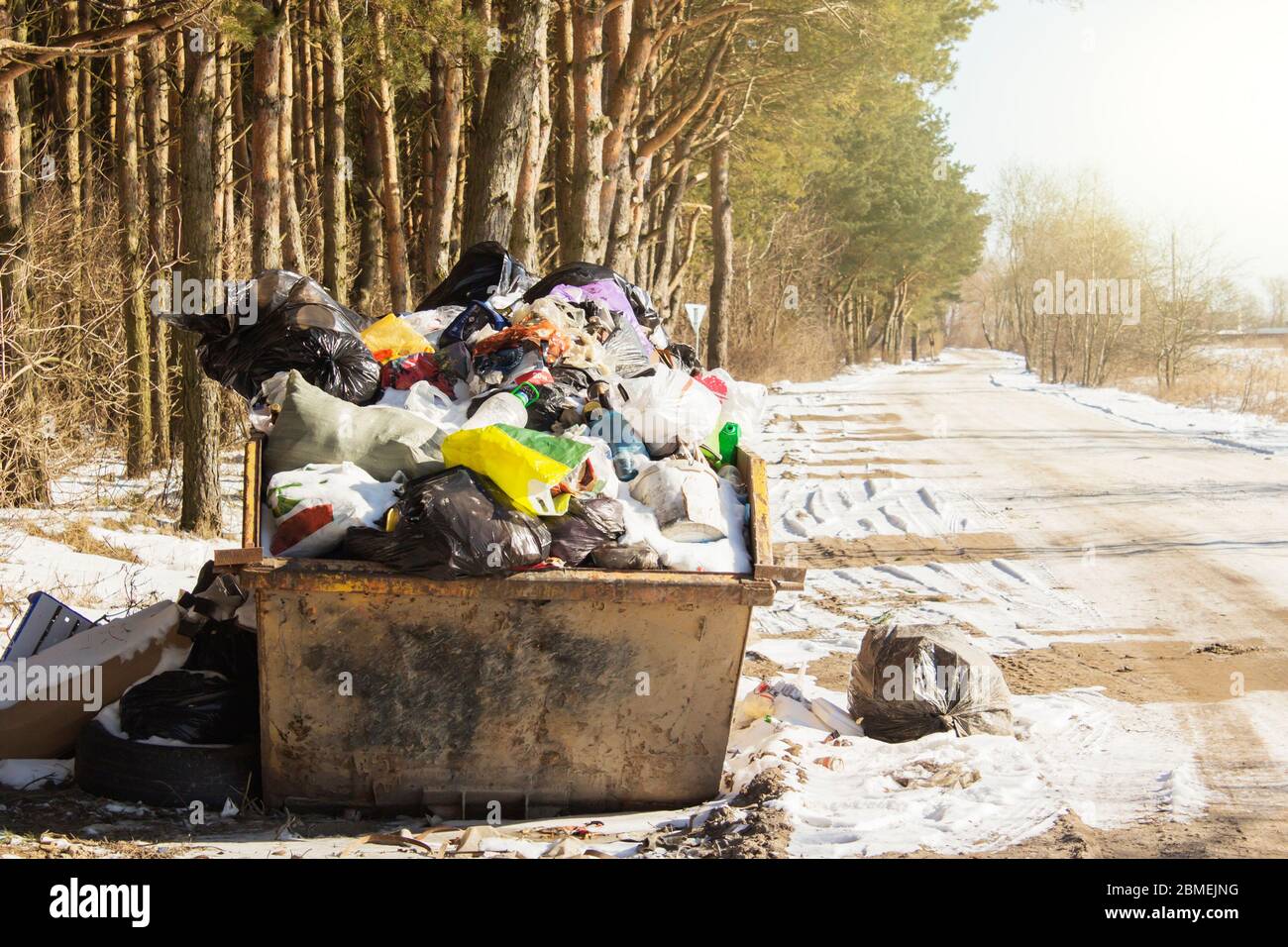 Garbage waste in park full of all sort of trash Stock Photo - Alamy