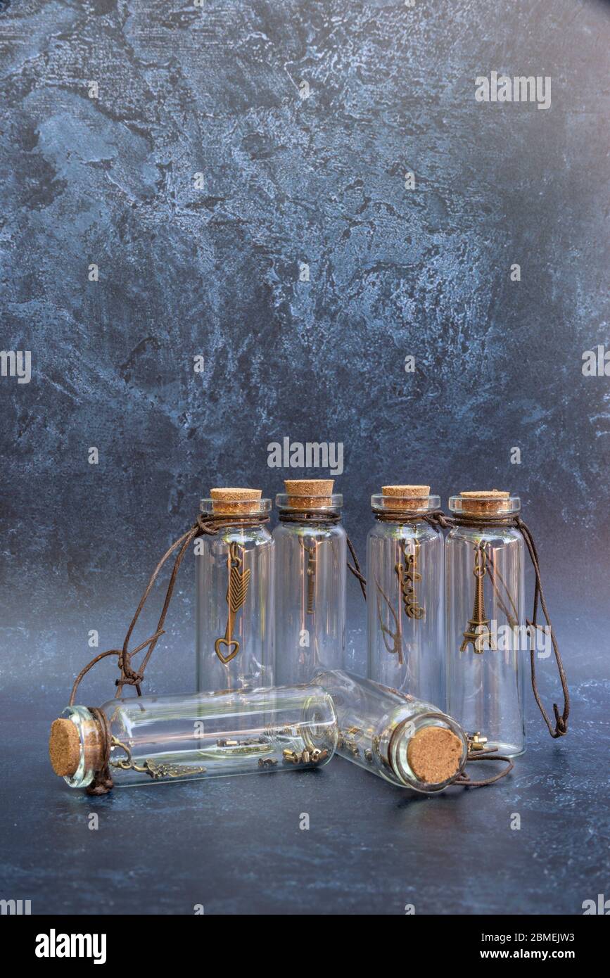 Romantic old vintage glass wish bottle with good luck charm inside ...