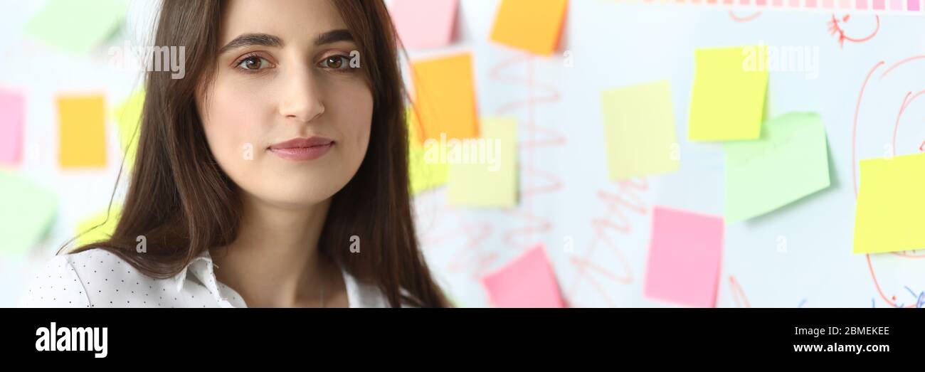 Pretty female designer Stock Photo - Alamy