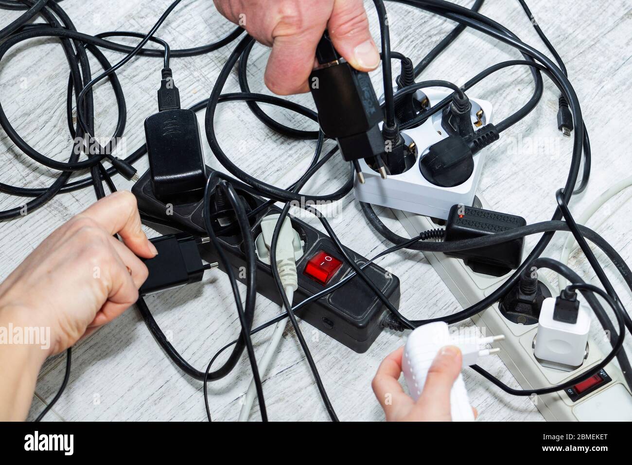 Lots of electrical outlets-enabled devices. Power saving Stock Photo ...