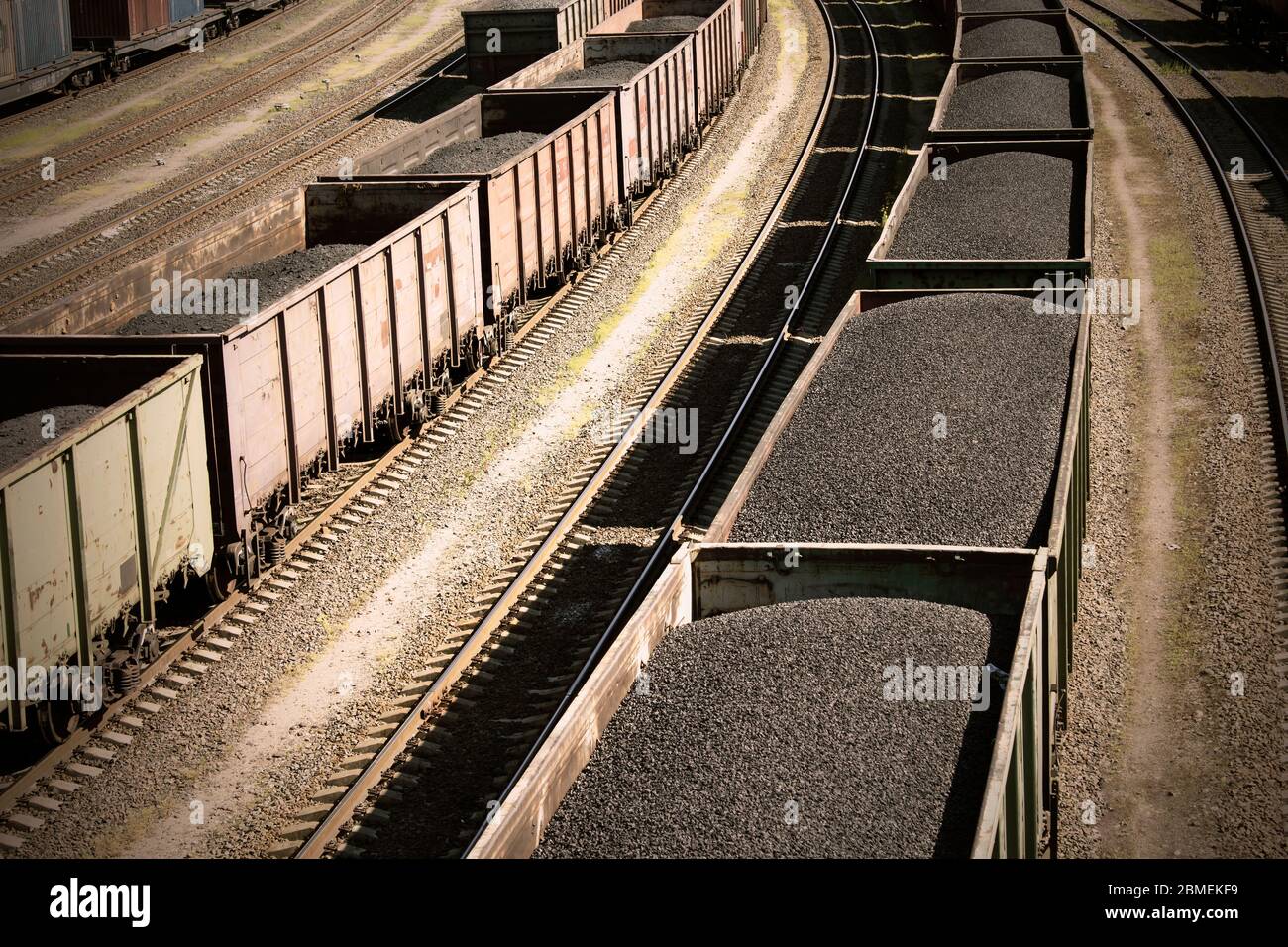rail cars loaded with coal, a train transports coal Stock Photo - Alamy
