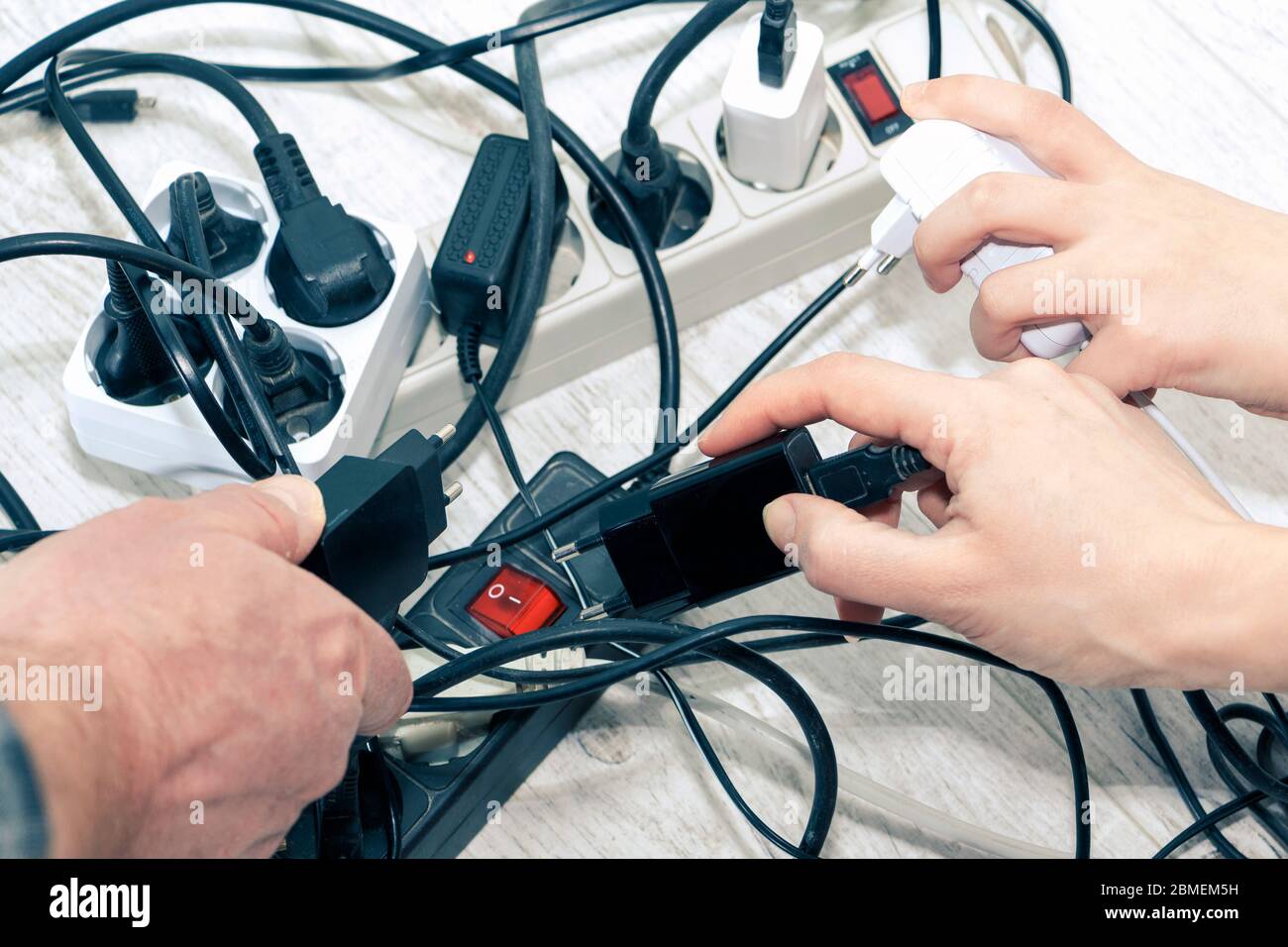 Overloaded socket hi-res stock photography and images - Alamy