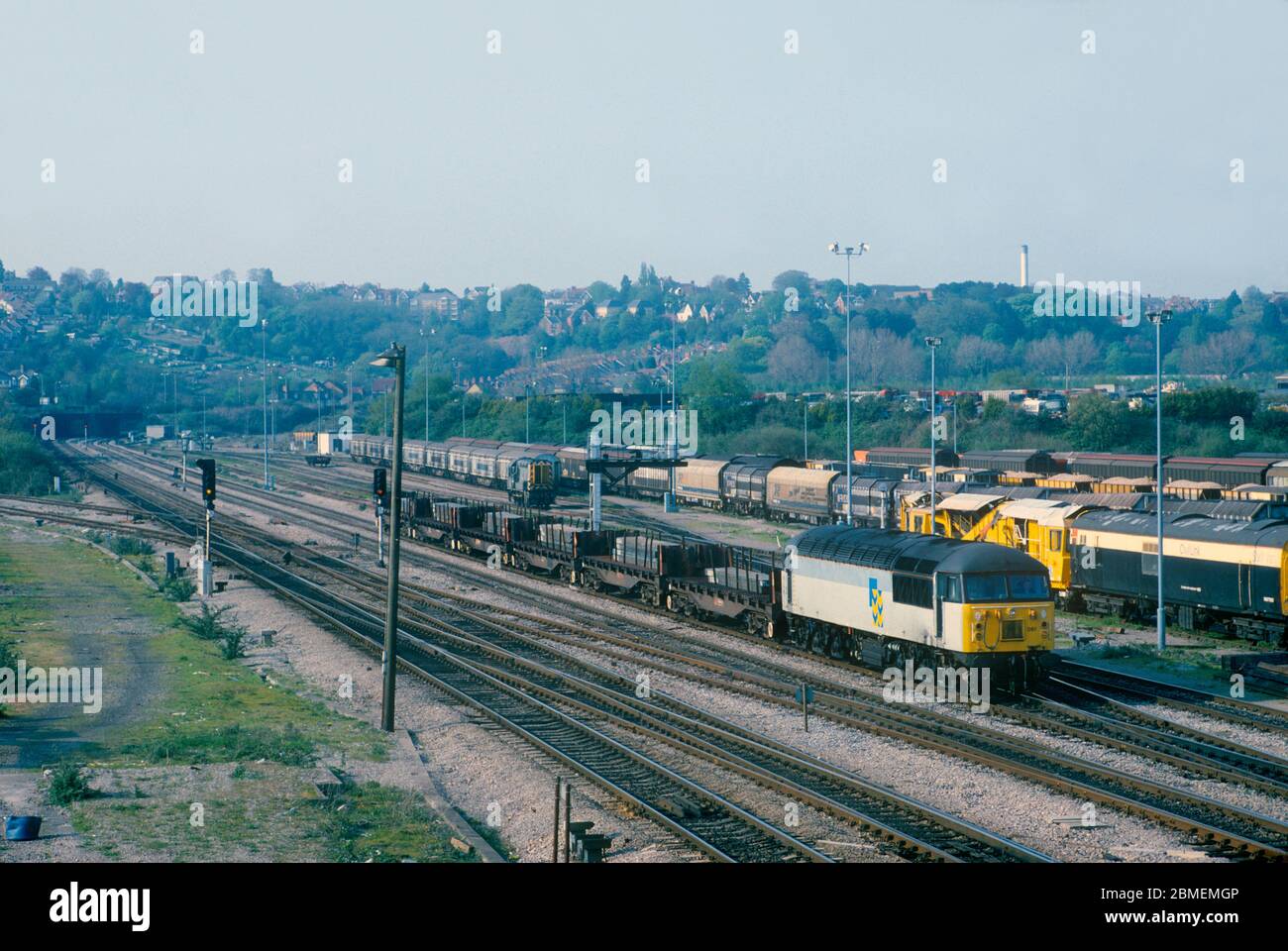 A Class 56 diesel locomotive 56061 passes the yard at Alexandra Dock ...
