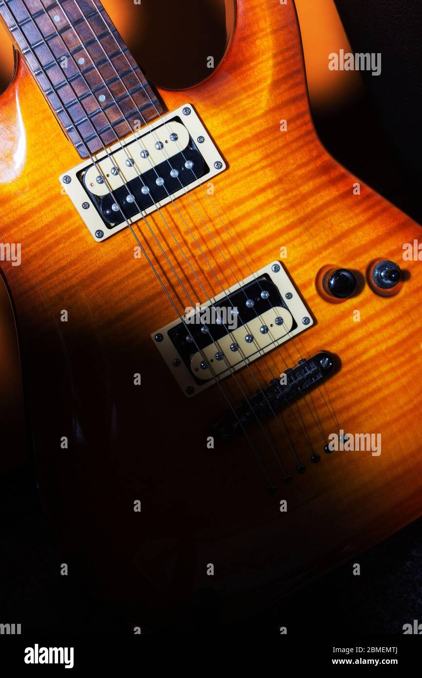 Musical concept. Electric guitar under a beam of light. Musical ...