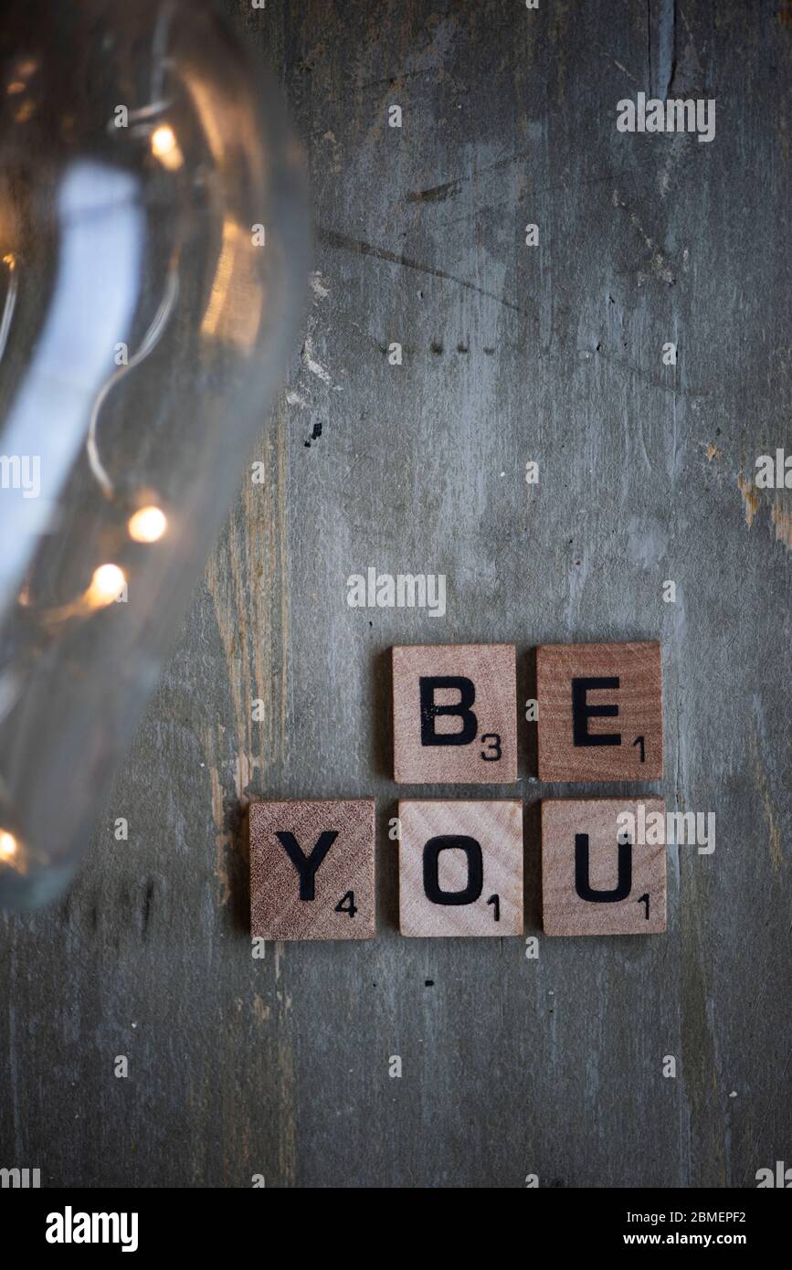 The words Be You in Scrabble letters Stock Photo - Alamy