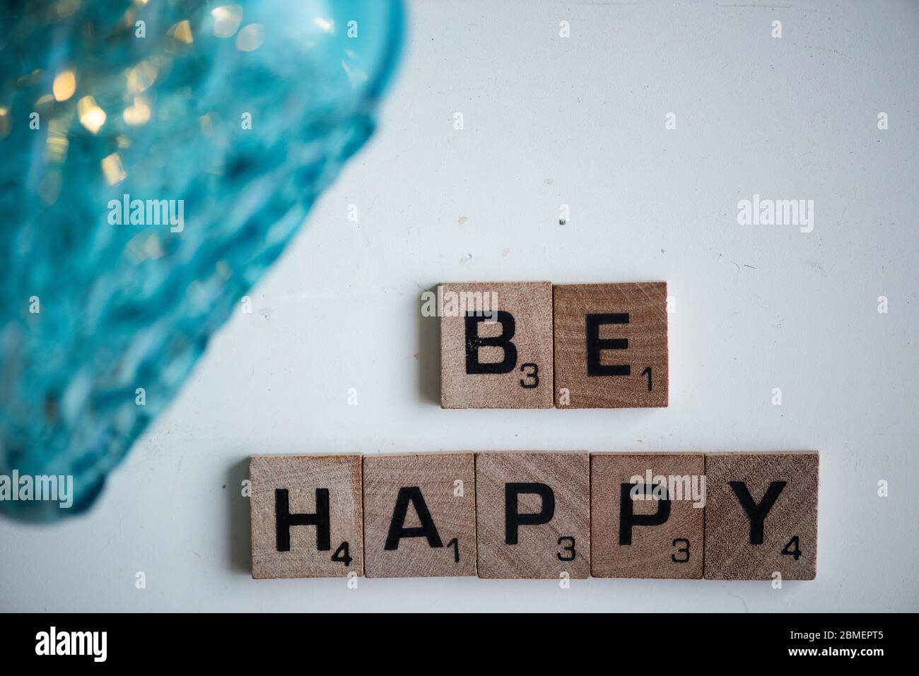 Be happy in block letters Stock Photo - Alamy