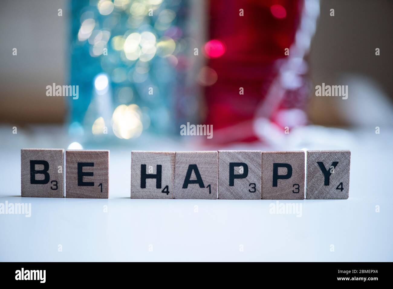 Be happy in block letters Stock Photo - Alamy