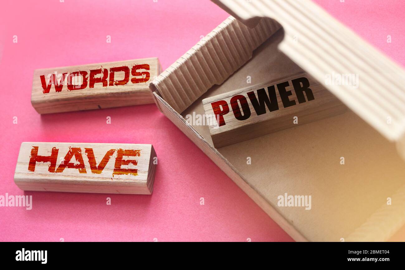 Words have power words on wooden blocks put in box and outside ...