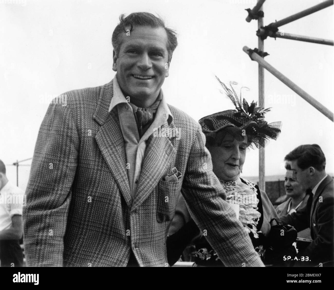 Director LAURENCE OLIVIER with Extra and Crew Members on set candid during filming of THE PRINCE ...