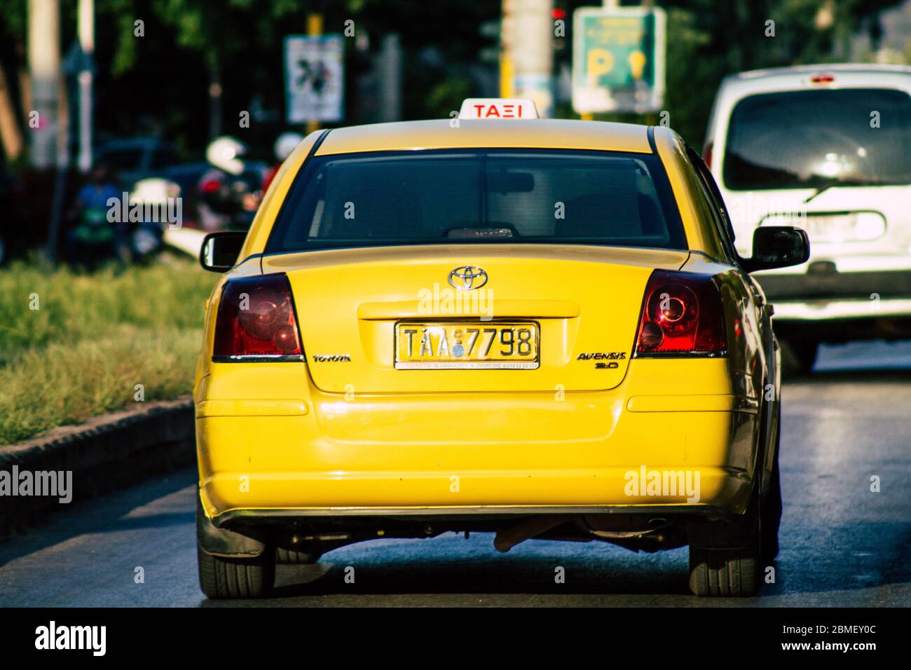 Athens Greece September 7, 2019 View of Greek yellow taxi driving ...