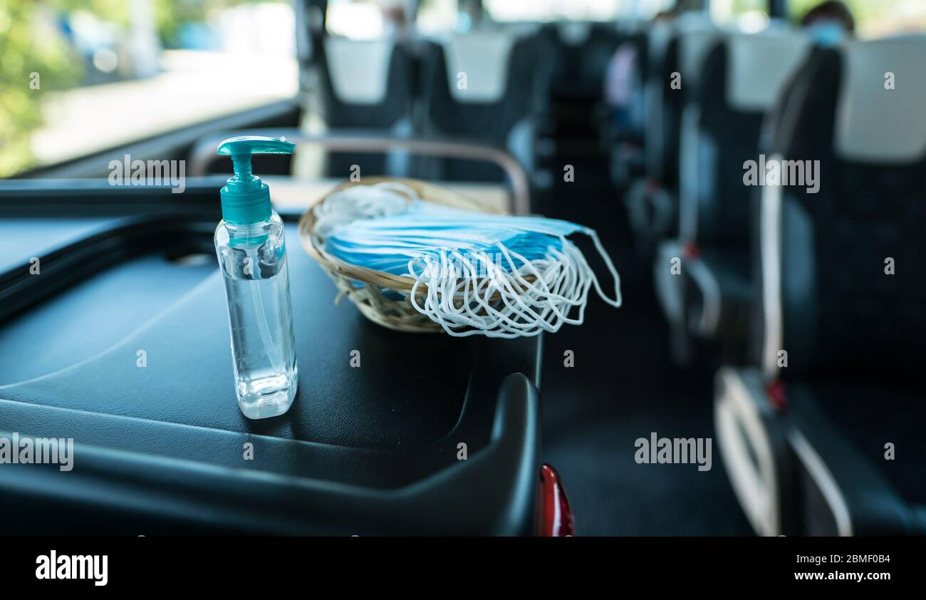 Free hand sanitizer and medical face mask on the bus, compliance with ...